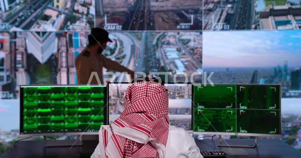A Saudi Gulf man runs the security section, tracks surveillance cameras ...
