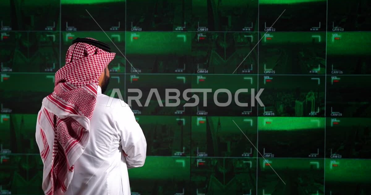 A Saudi Gulf man runs the security section, tracks surveillance cameras ...