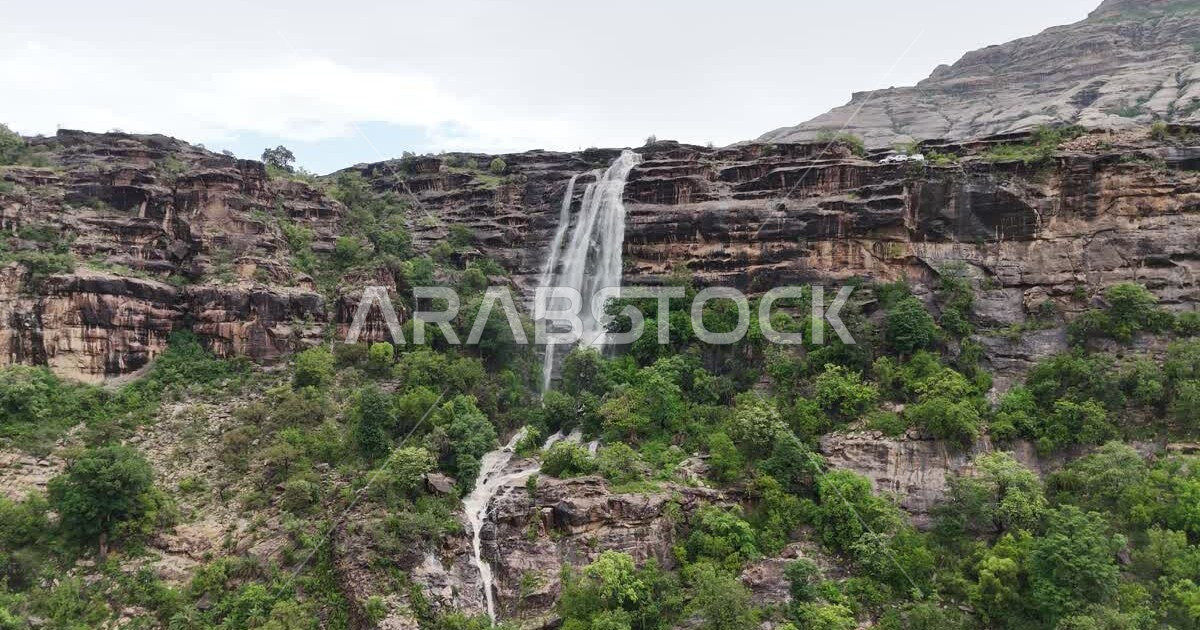 Waterfalls on the mountain slopes and slopes, afforestation and green ...