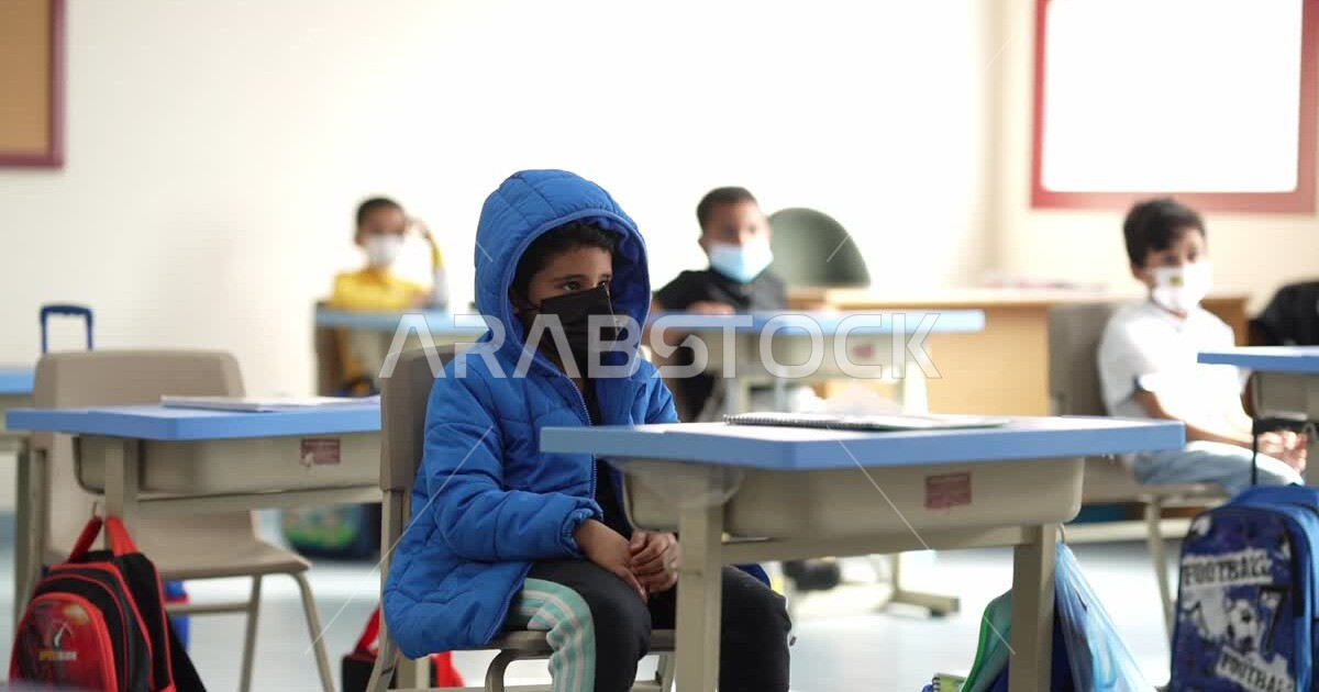 A group of Saudi Arabian Gulf students sitting in their seats inside ...