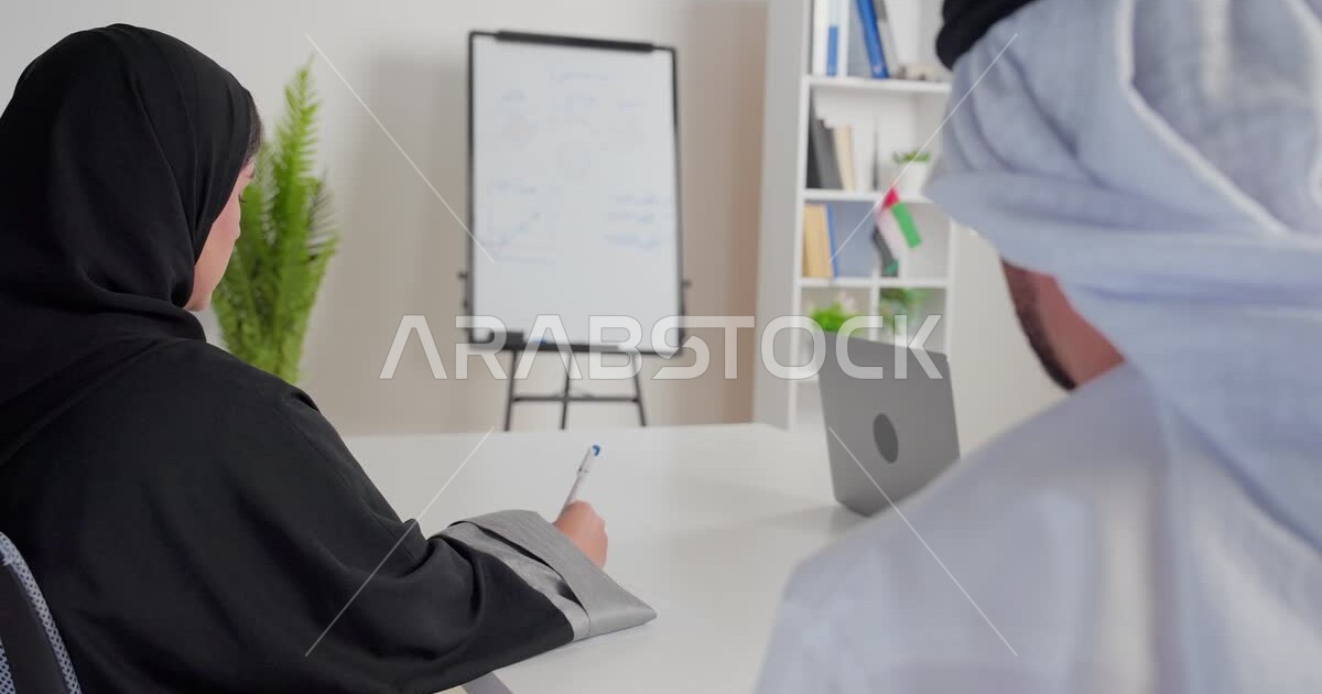 Writing and taking notes on paper, holding training and qualification ...