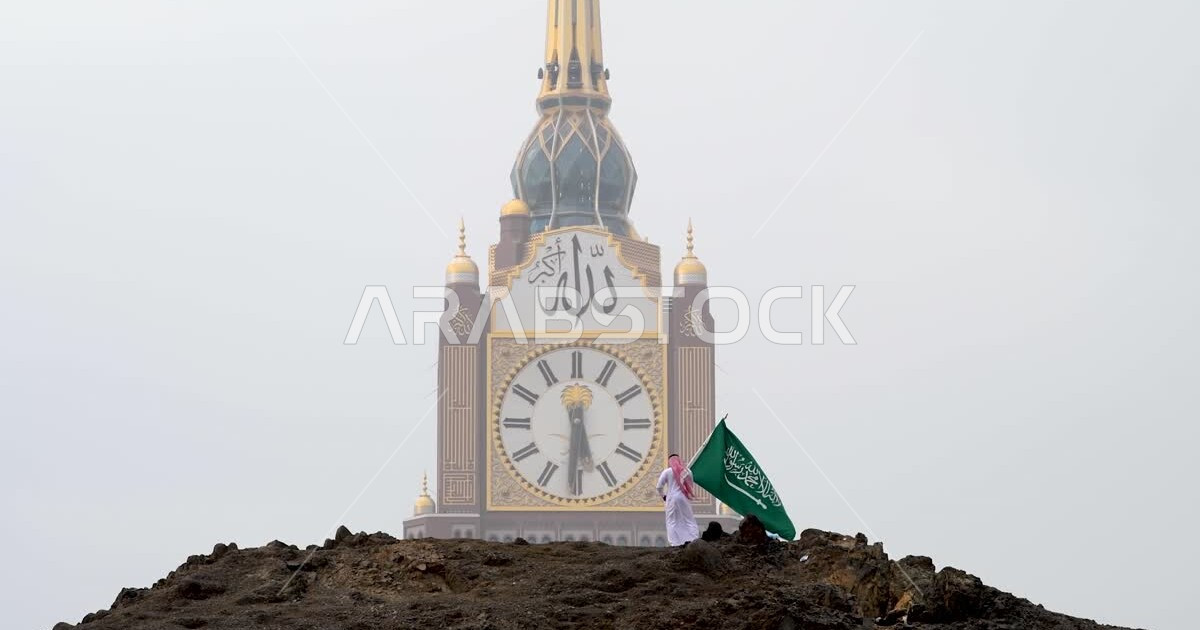 Clock Tower in Mecca, Saudi Arabia, Saudi Arabian Gulf Arab man wearing ...