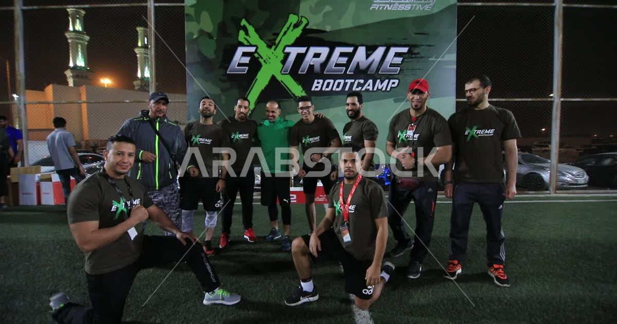 A healthy lifestyle, a group of Gulf Saudi Arab youth exercising on the ...