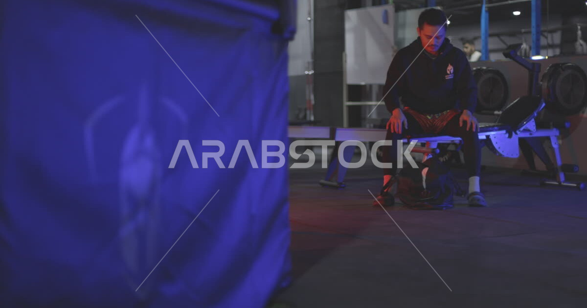 Learning martial arts, close-up of a young Saudi Arabian Gulf man in ...