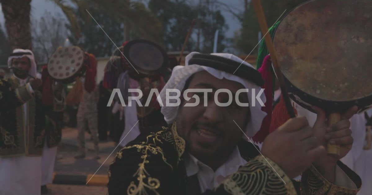 Beating drums enthusiastically in commemoration of the reunification of ...