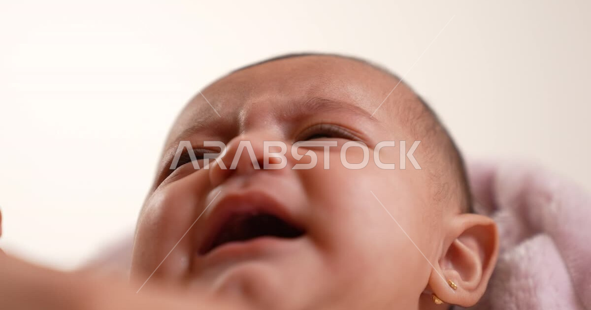 Caring for and nurturing children, gestures of crying and feeling upset ...