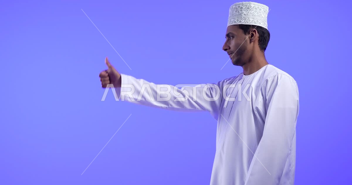 Feeling satisfied and accepted, close-up side view of young Omani Gulf ...