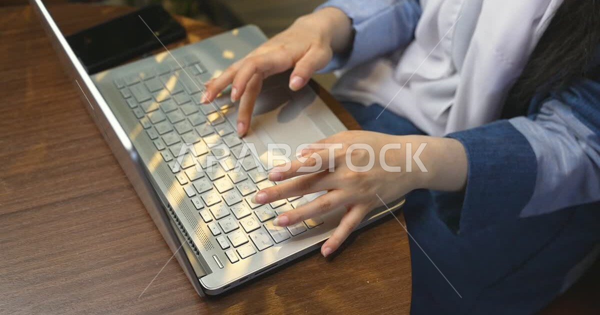 Close-up of a laptop computer used by a Saudi Arabian Gulf girl, a ...