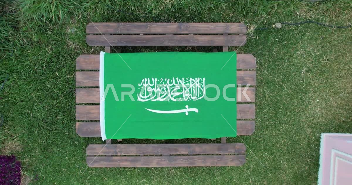 Drone photography from afar of the flag of the Kingdom of Saudi Arabia ...