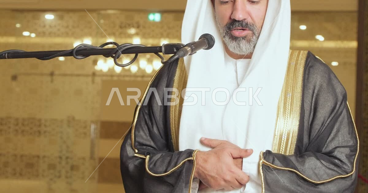 Performing Islamic religious duties, performing prayers on time, close ...