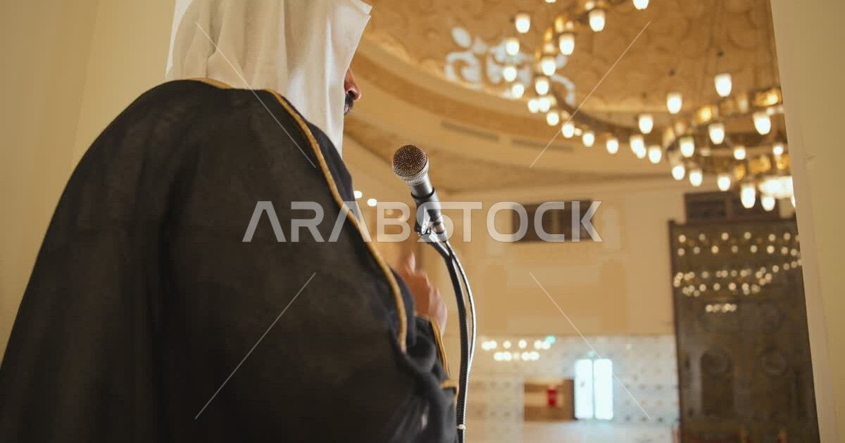 Performing Islamic religious duties, a close-up shot from the side of ...