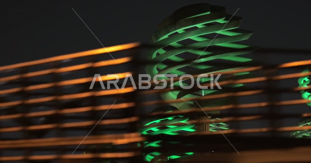 Illuminated art sculptures in the form of green trees at night in Arqa ...