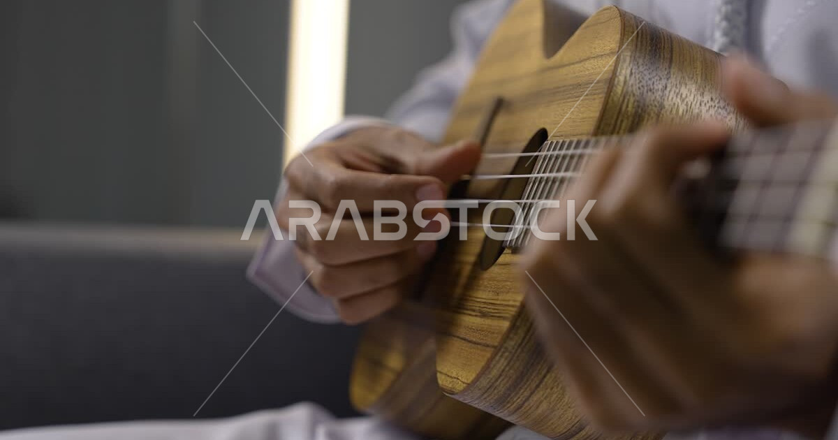 Music and entertainment activities, close-up of an Emirati Gulf Arab ...