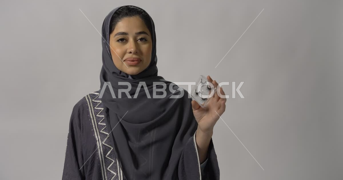 Concept of caring for beauty and skin, close-up of a veiled Saudi ...