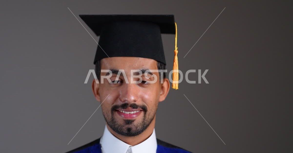 Distinctive academic dress, close-up of a Saudi Arabian Gulf student ...