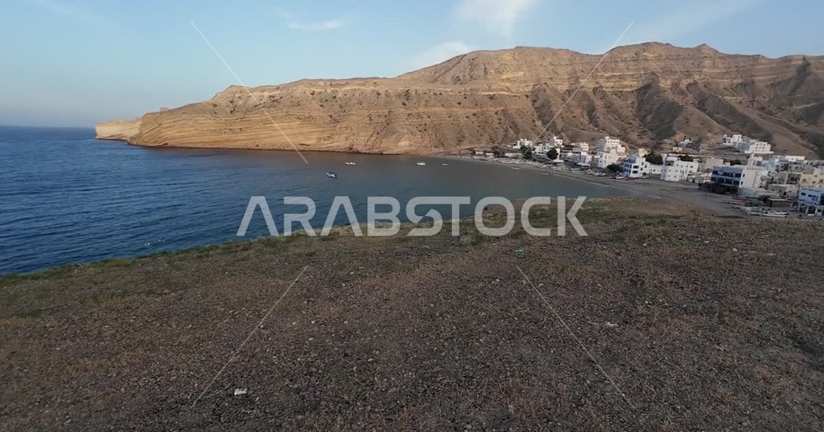 Rocky terrain and sandy beaches on the Omani coast, famous coastal ...