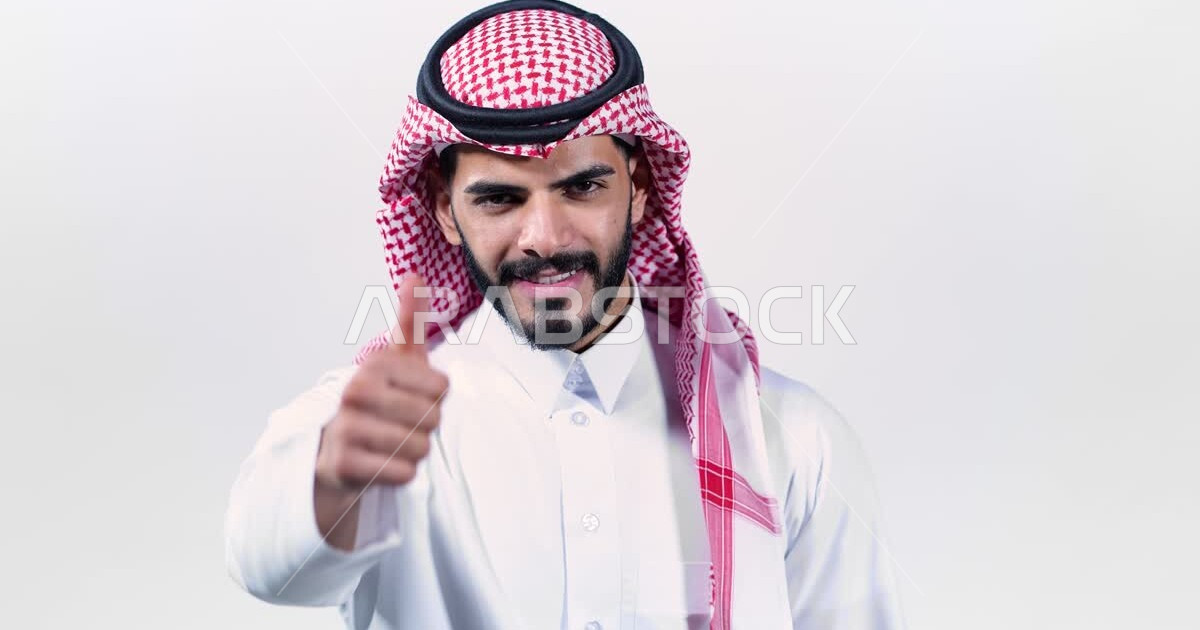 Portrait of a Saudi Arabian Gulf youth with gestures, facial ...