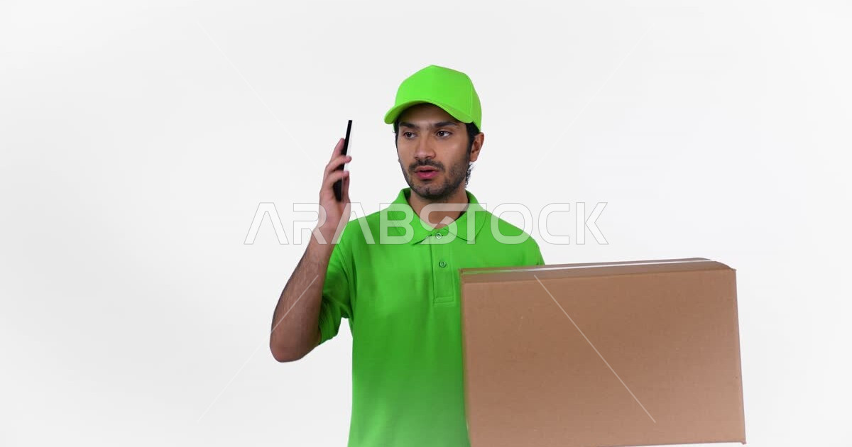 Portrait of a Saudi Arabian Gulf man working in delivering orders and ...