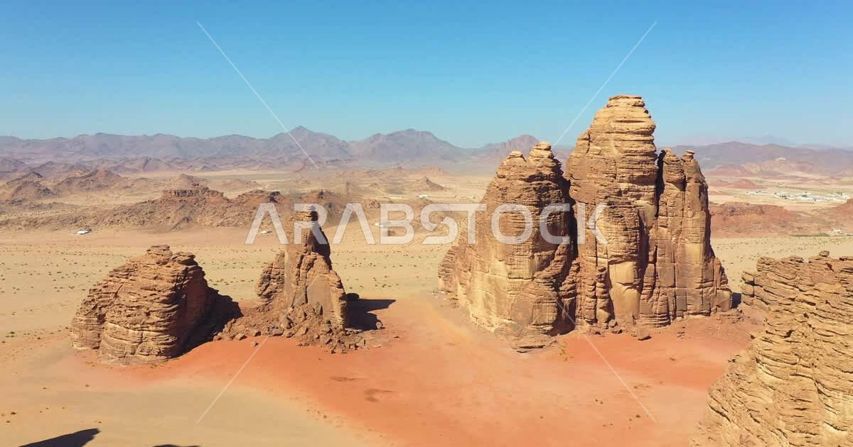 Drone photography of the towering mountains and rock formations in the ...