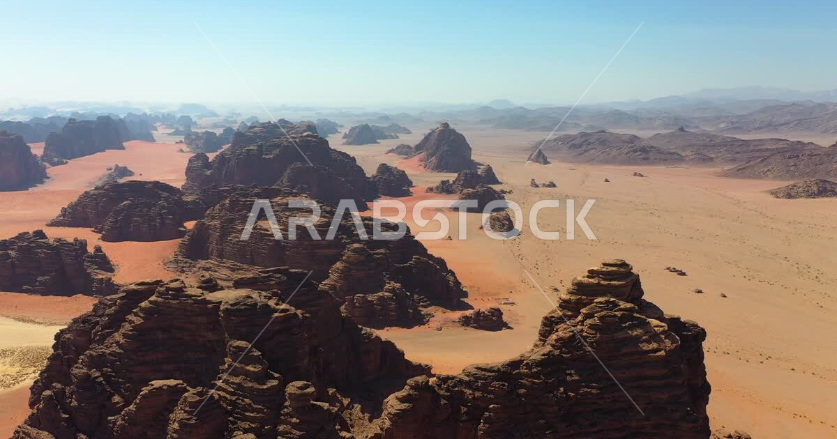 Drone photography of the towering mountains and rock formations in the ...