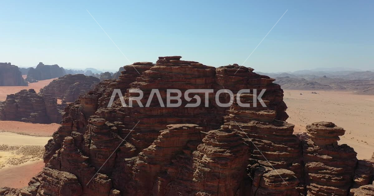 Drone photography of the towering mountains and rock formations in the ...