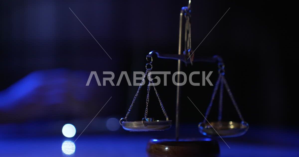 Close-up photography of the scale of justice near a Saudi Arabian Gulf ...