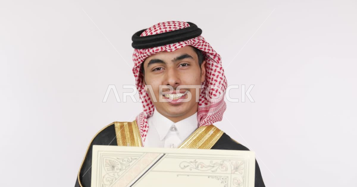 Portrait of a smiling Saudi Gulf university student, wearing a ...