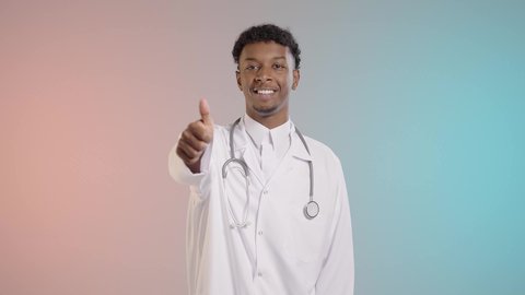 A black screen display, a portrait of an Arab Gulf Saudi female doctor ...