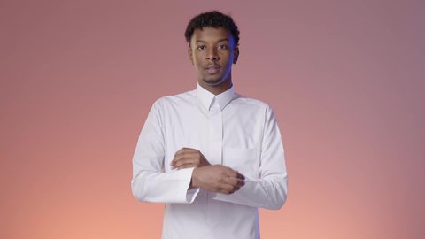 Two Arab Gulf Saudi children wearing traditional attire are sitting ...
