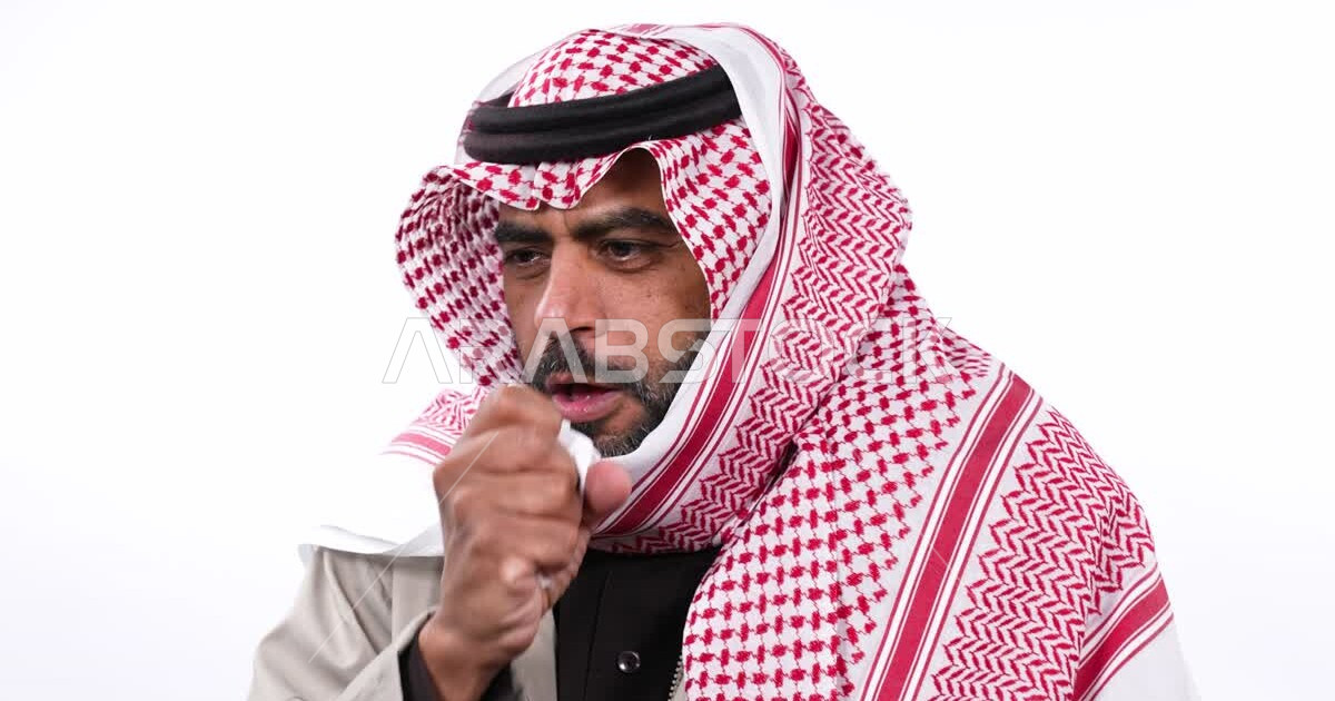 Portrait of a Saudi Arabian Gulf man feeling cold, suffering from cough ...