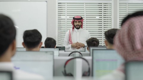 Holding training courses for students, an Arab Gulf Saudi speaker and ...