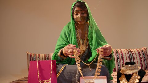 Wedding customs in the UAE, presenting precious gifts to the bride, a ...