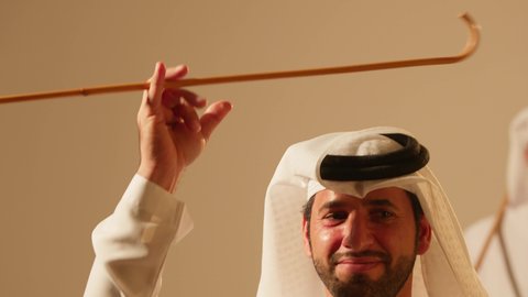 The background of the folkloric performance troupe is traditional ...