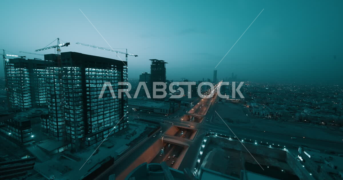 A view from the top of buildings and roads in the city of Riyadh in the ...