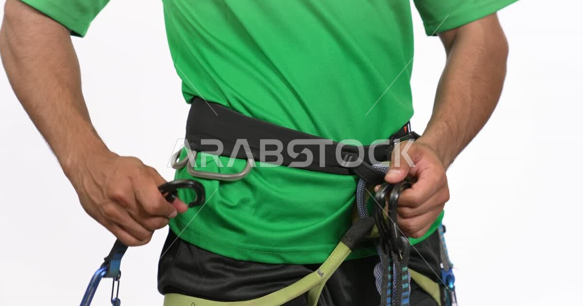 Portrait of a Saudi Arabian Gulf Arab man wearing a sports uniform and ...