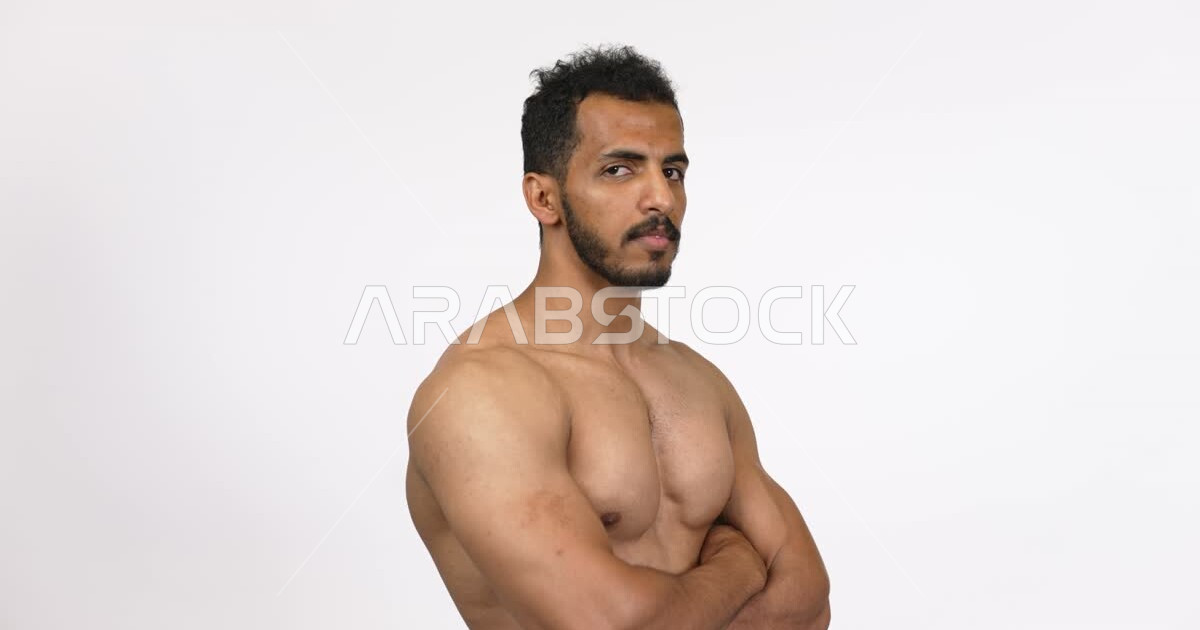 Portrait of a Saudi Arabian Gulf Arab man, a happy boxer, wearing ...