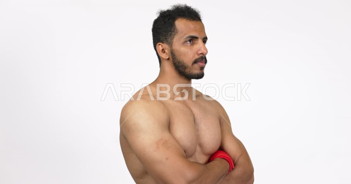 Portrait of a Saudi Arabian Gulf Arab man, a happy boxer, wearing ...