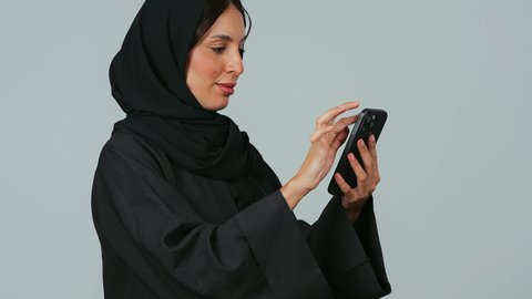 Looking at something, using modern technological devices for ...