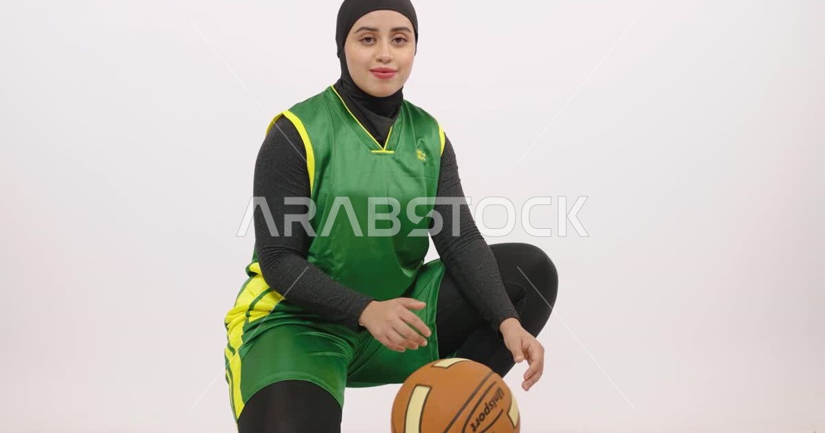 Portrait of a veiled Saudi Arabian Gulf woman wearing the clothes of ...