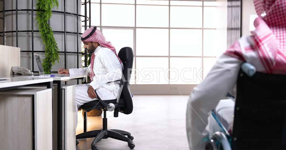 A Saudi Arabian Gulf employee of people of determination working in the ...