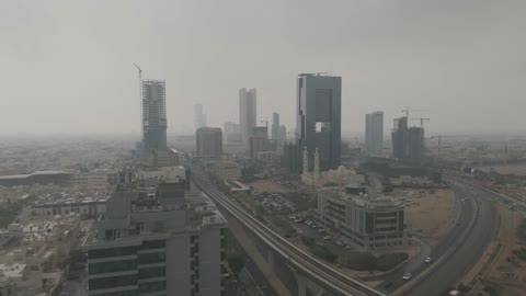 The Ministry of Transport building, traffic flow of cars, urban growth ...