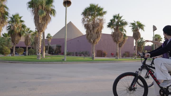 Engaging in a collective recreational activity for the whole family, a ...