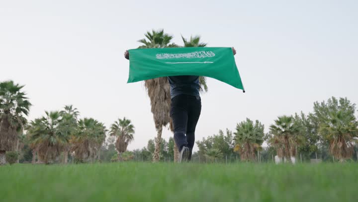 The concept of safety and reassurance, an Arab Saudi Gulf man wearing ...