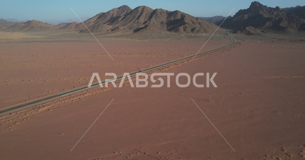 Drone photography of the road for cars in the middle of the desert in ...
