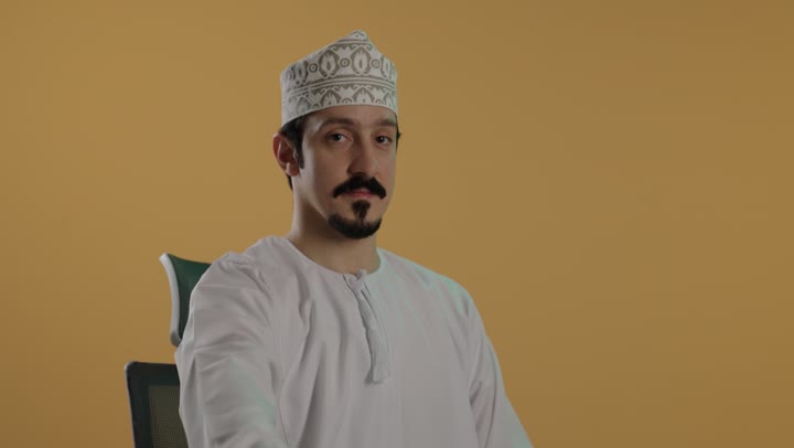 Facial features are upset and dissatisfied with something, an Arab Gulf ...