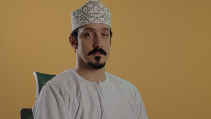 Facial features are upset and dissatisfied with something, an Arab Gulf ...