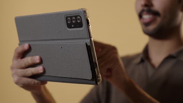 Focus and happiness while writing text messages, an Arab Gulf Saudi man ...