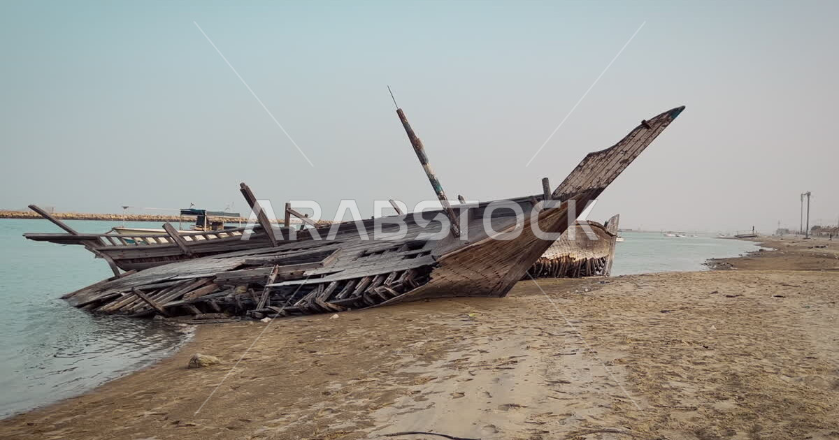 A depiction of an old heritage boat on a beach in the Kingdom of Saudi ...