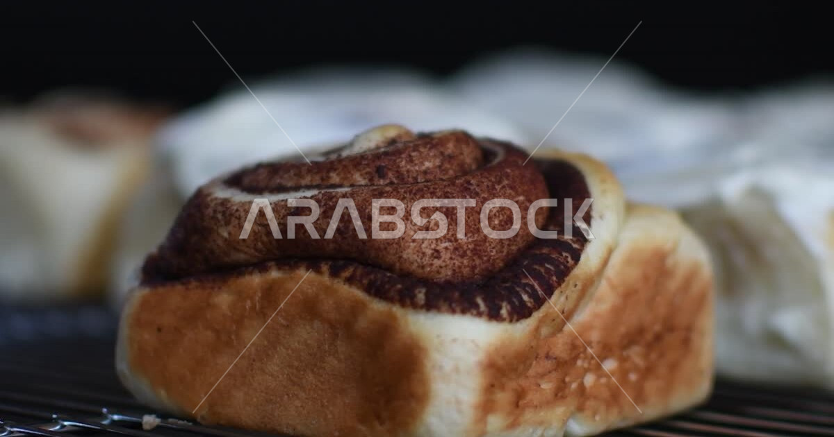 Close-up of delicious decorated cinnabon candy bars, cinnabon, pastries ...