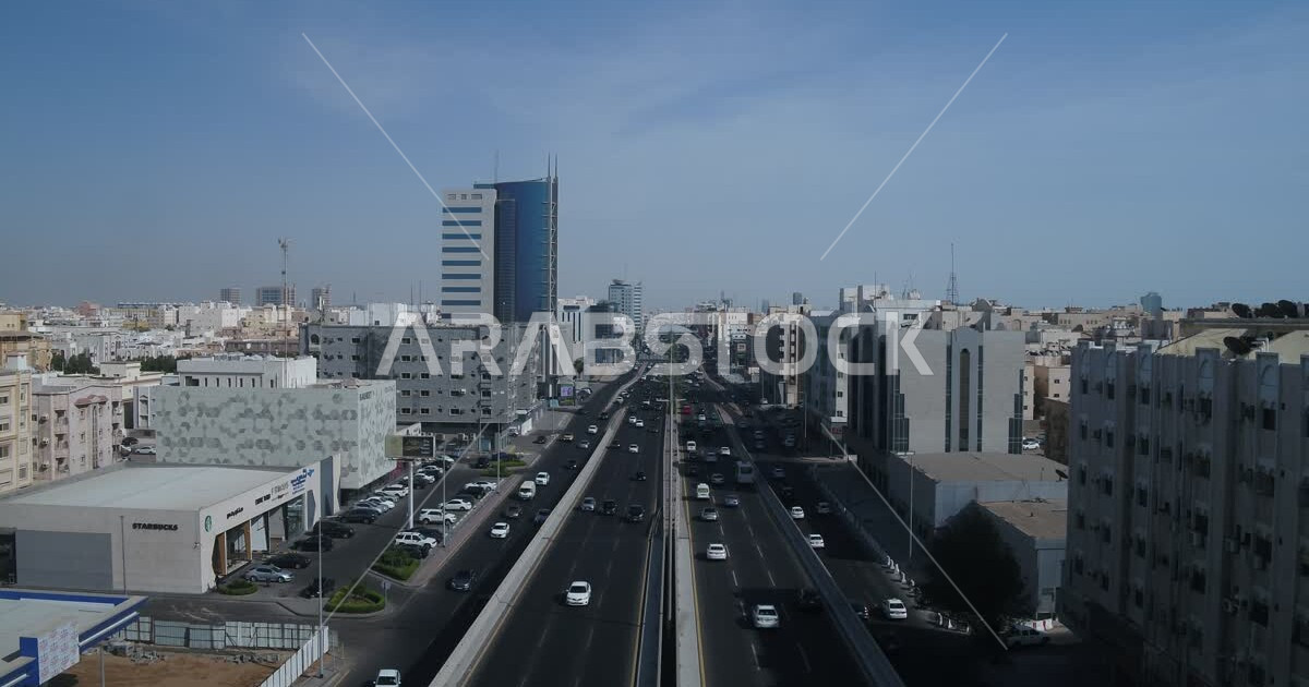 Aerial photography from above of car traffic on the highway in the city ...